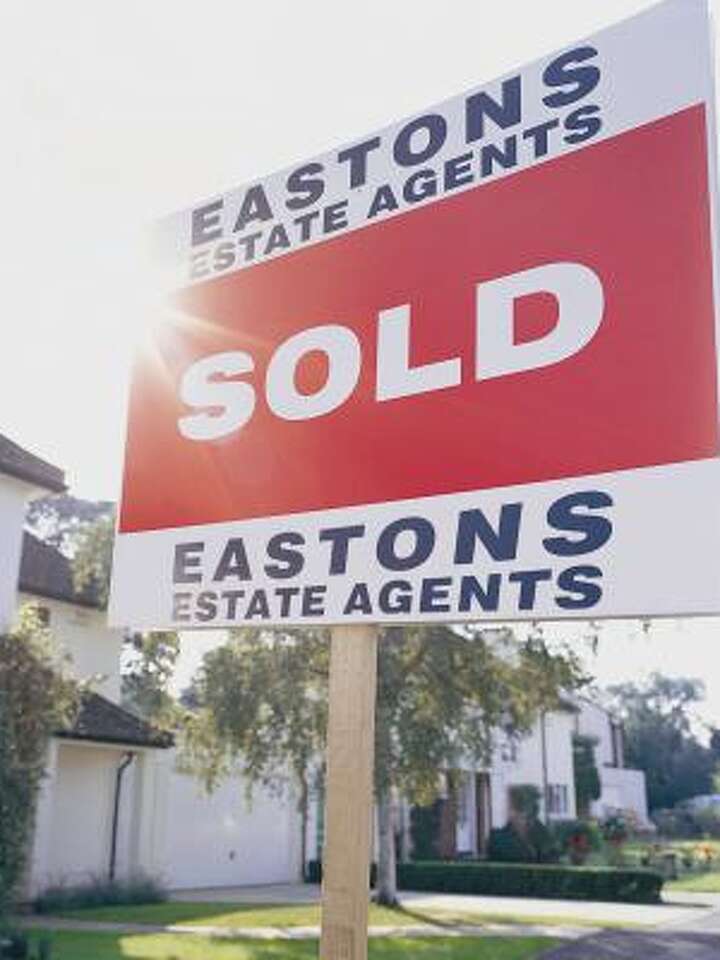 How to Record Journal Entries for a Purchased Home in Accounting