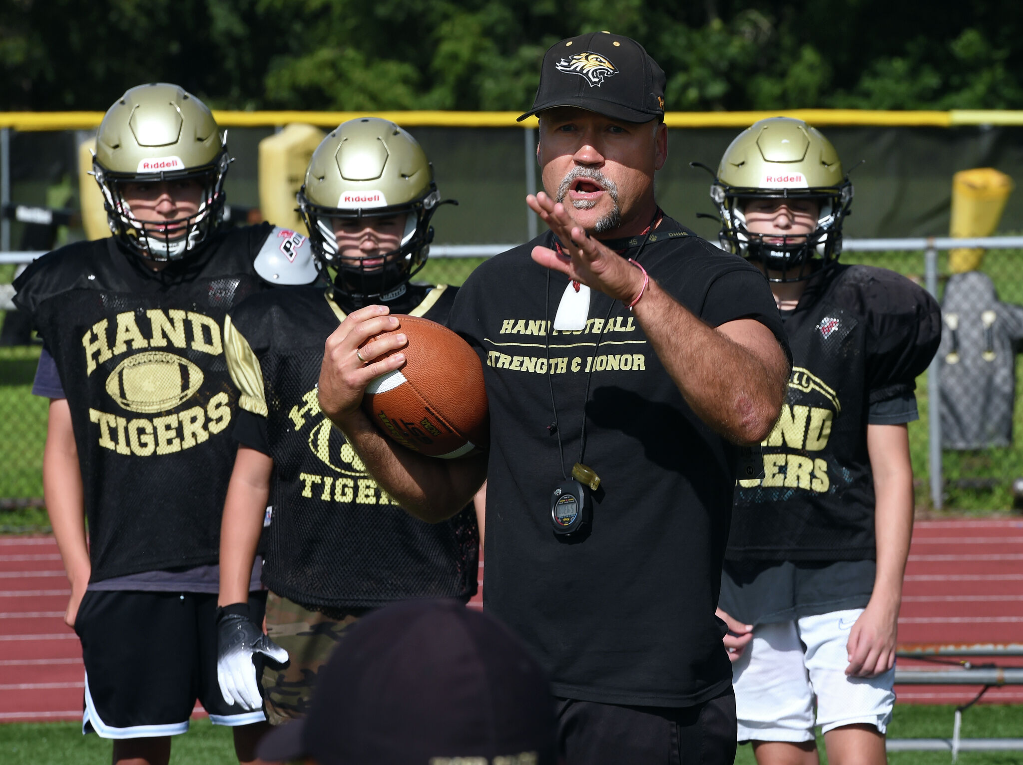 Daniel Hand High School football.too deep, physical for New London
