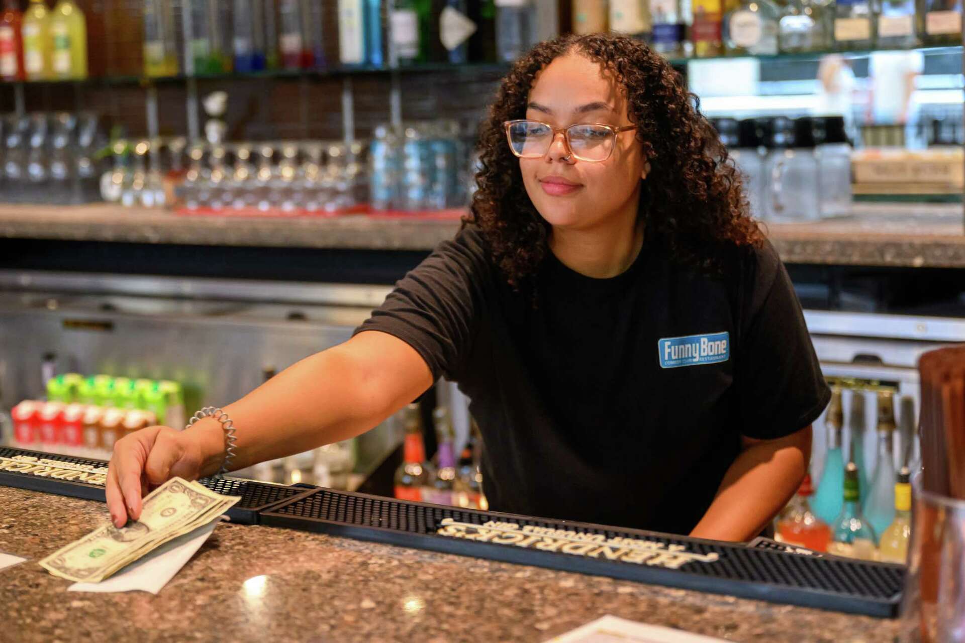 Tipped food service workers have a lower minimum wage in N.Y. That cou