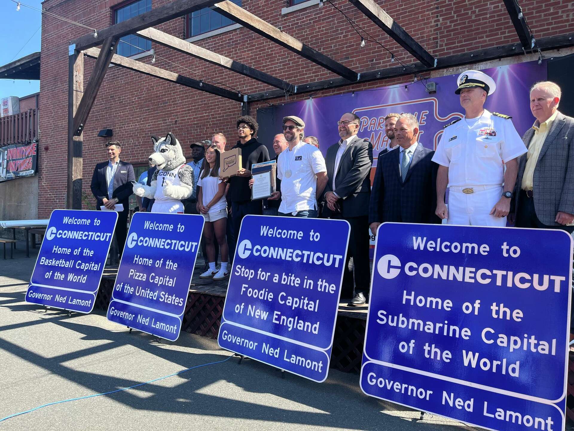 New highway 'Welcome' signs promote CT as a pizza, basketball capital