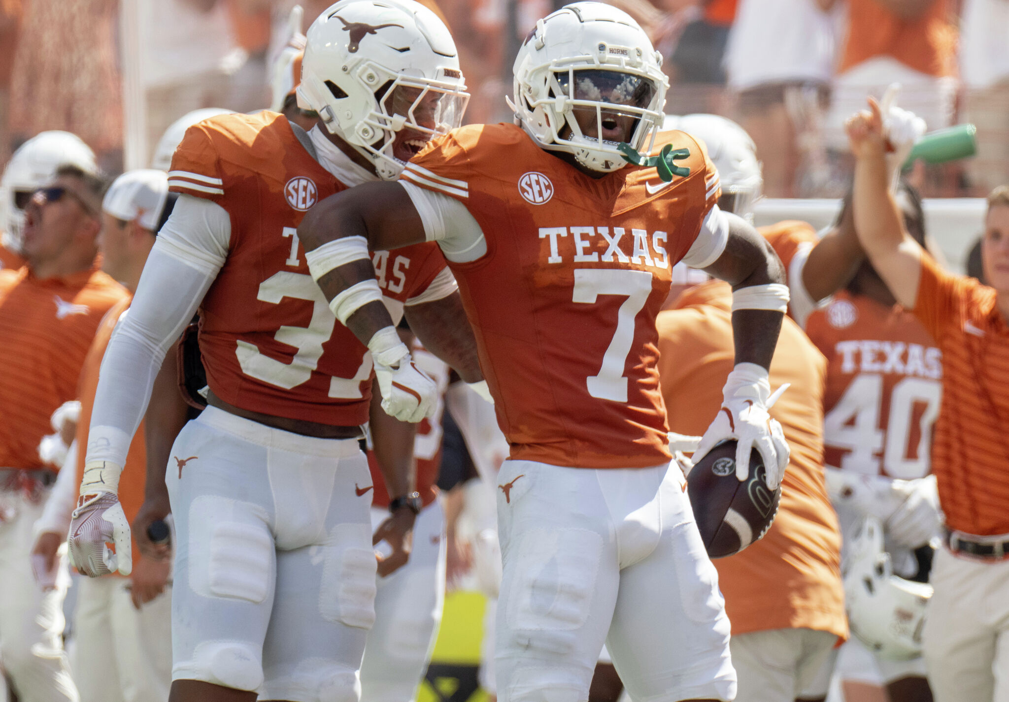 Why does Texas Longhorns football team have a sword on sidelines?