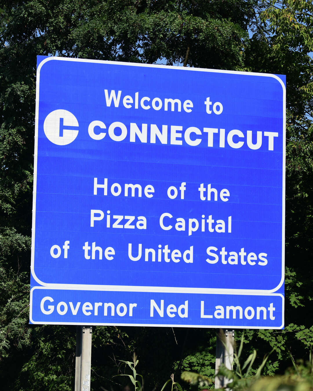New highway 'Welcome' signs promote CT as a pizza, basketball capital
