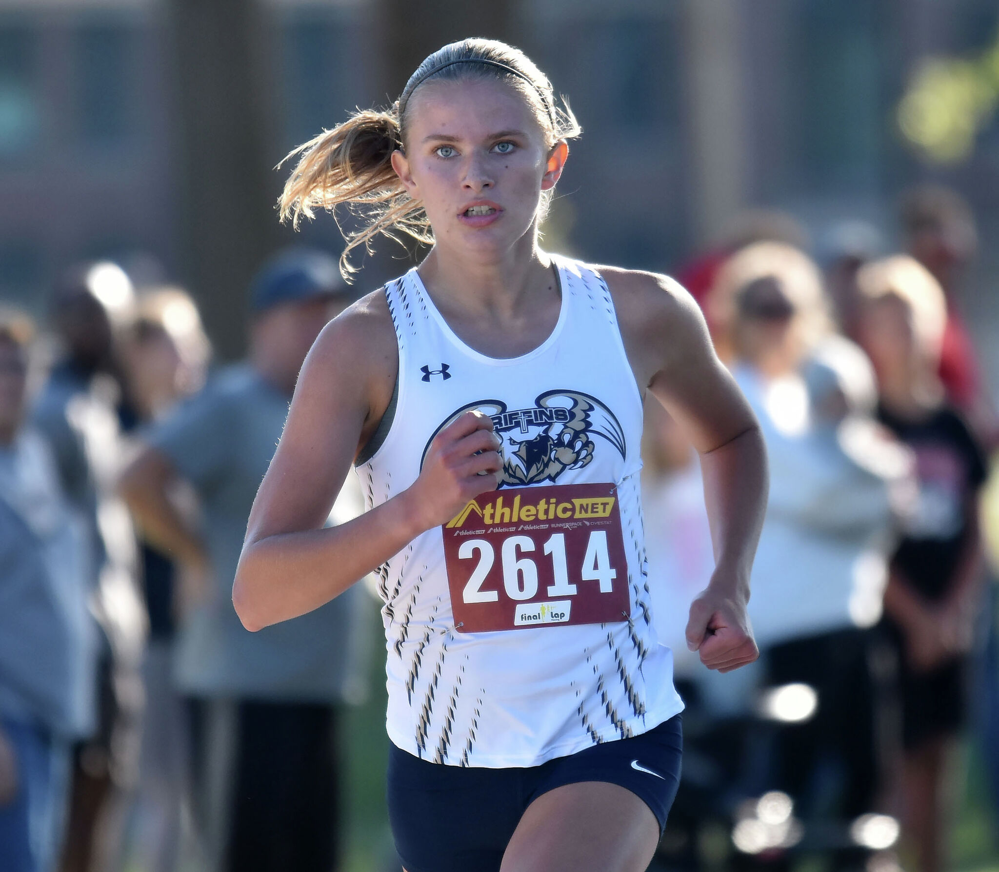 Father McGivney's Elena Rybak breaks school record, wins in Granite