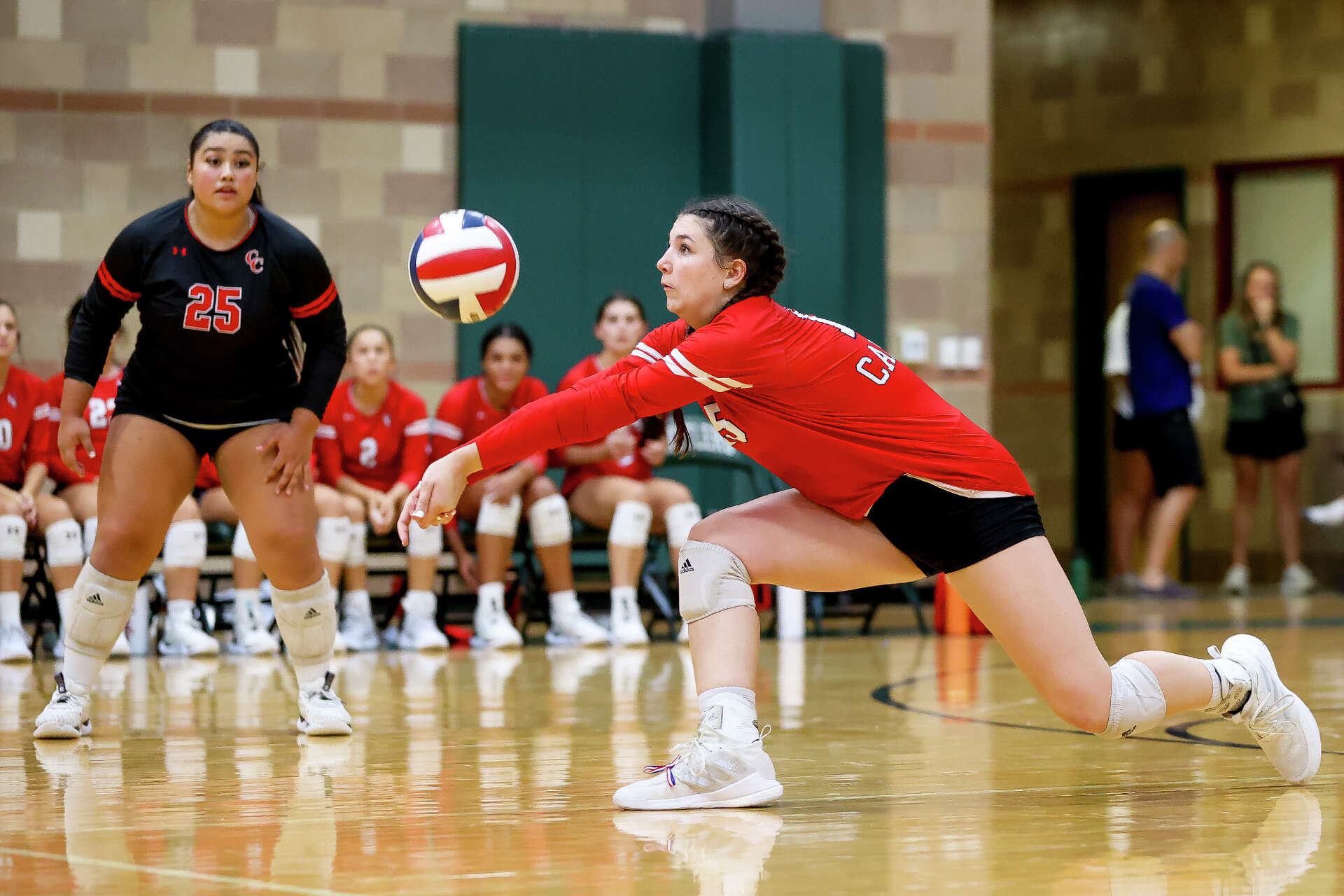 Reagan volleyball rallies for gritty win to close non-district play