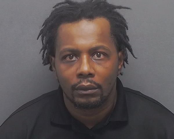 Father charged after child got behind the wheel at Family Dollar
