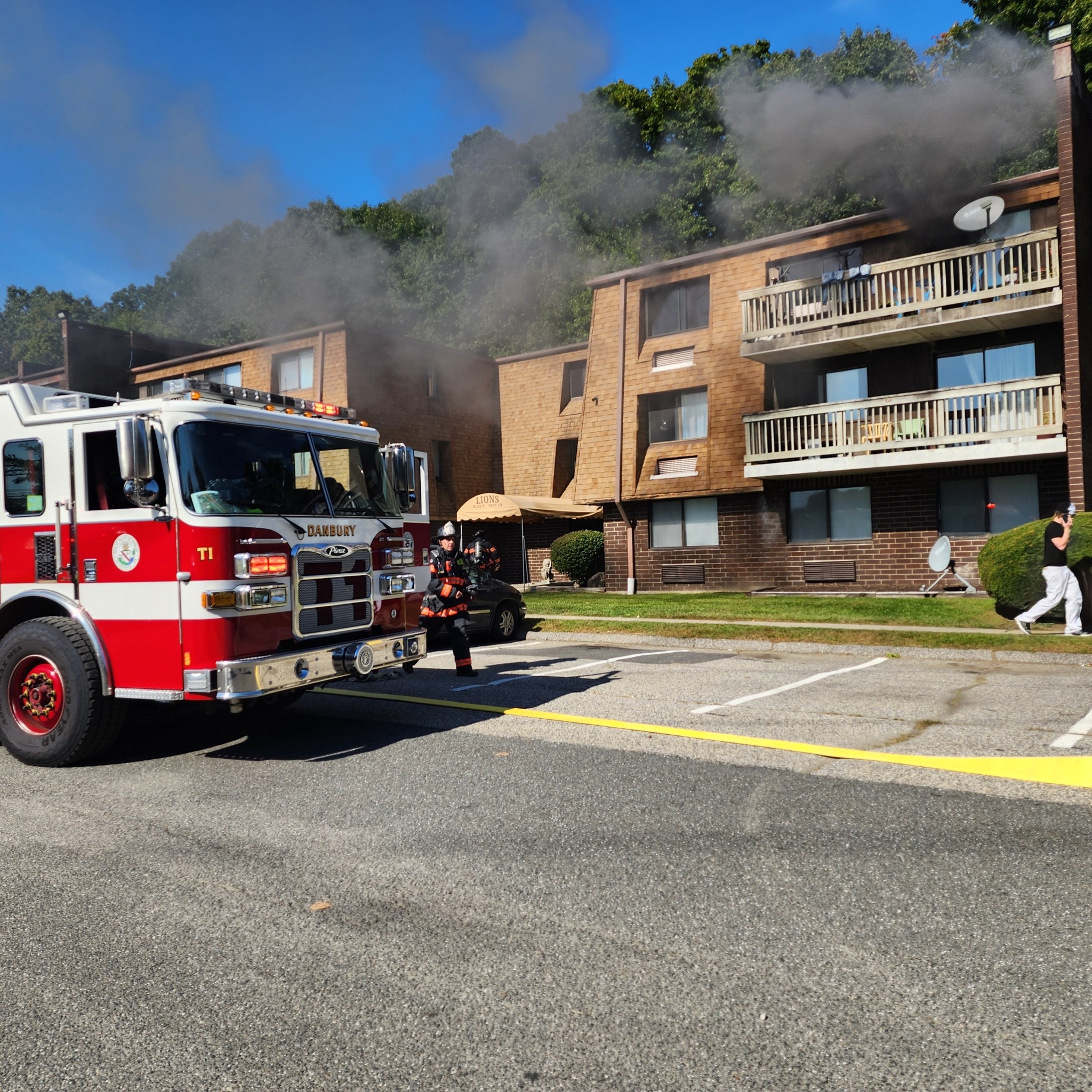 Official: Danbury firefighters rescue 5 residents, cat from condo fire