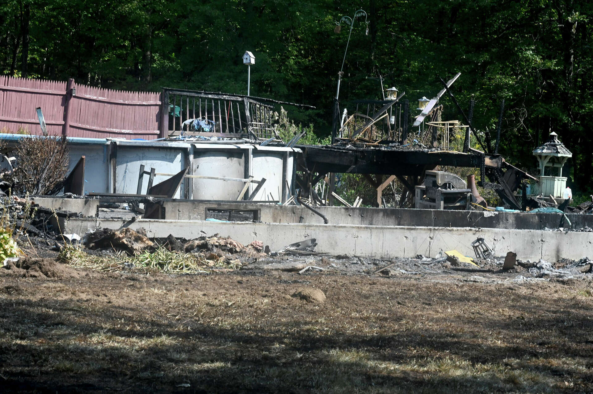 Woman found dead in 'suspicious' Thompson house fire ID'd as co-owner