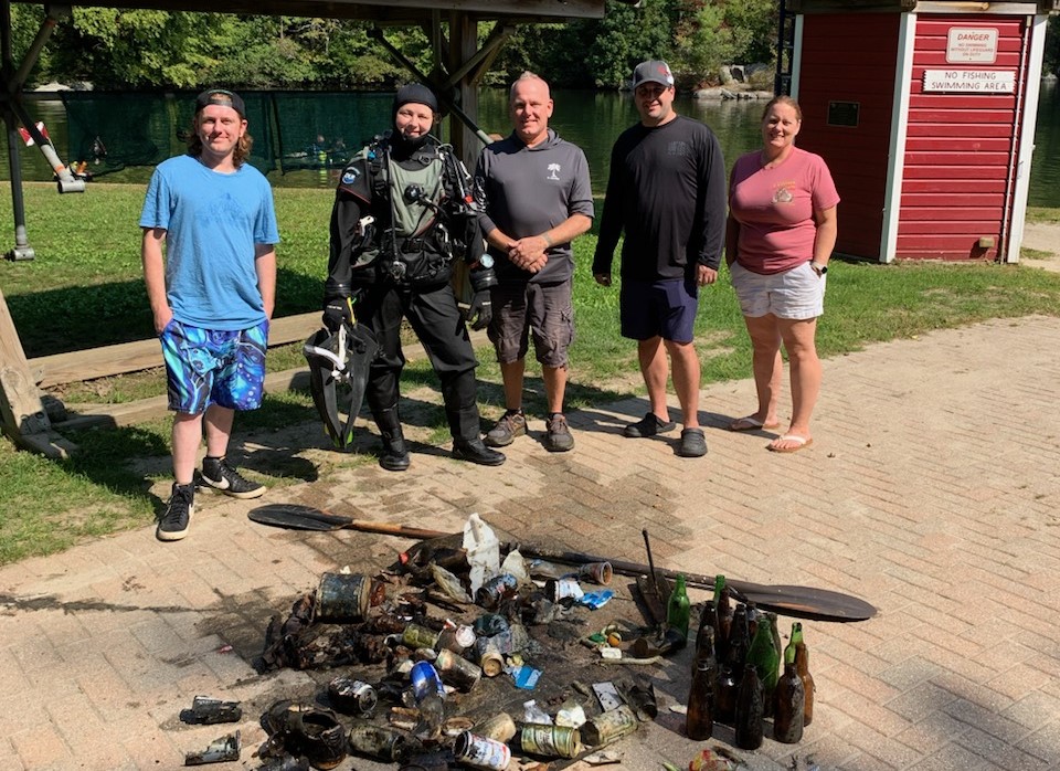 Scuba divers give New Hartford's West Hill Pond an underwater cleanup