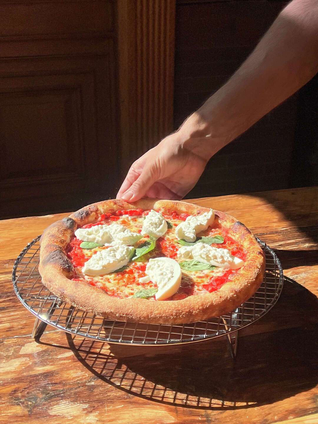City Beer Hall limiting free pizza after 13 years, launching Blu Pizza