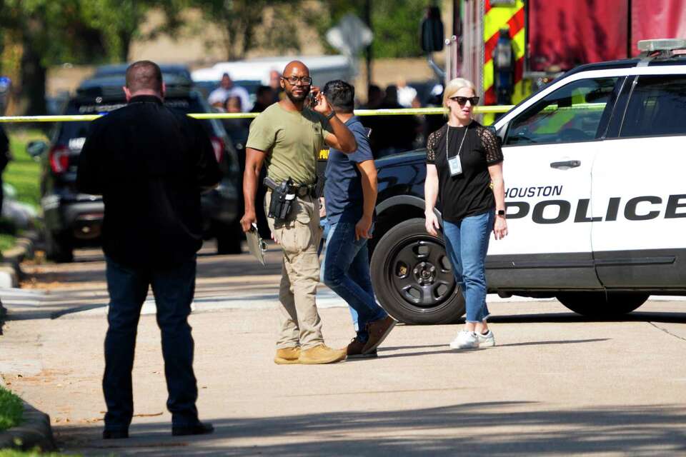 3 charged over Houston robbery that left police officer wounded