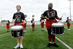 Port Arthur marching band has an all-girl snare line