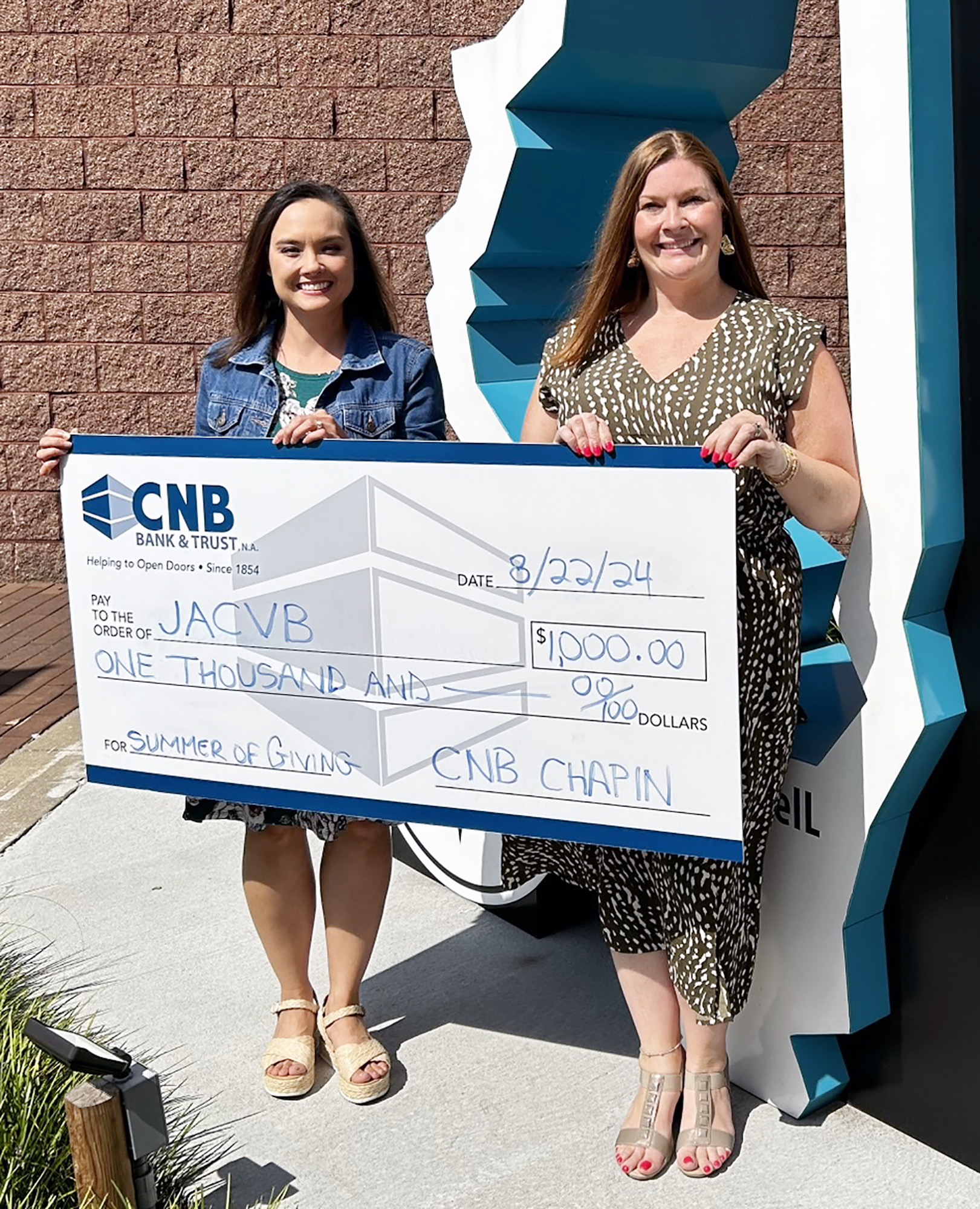 CNB Bank donates to visitors bureau as part of summer campaign