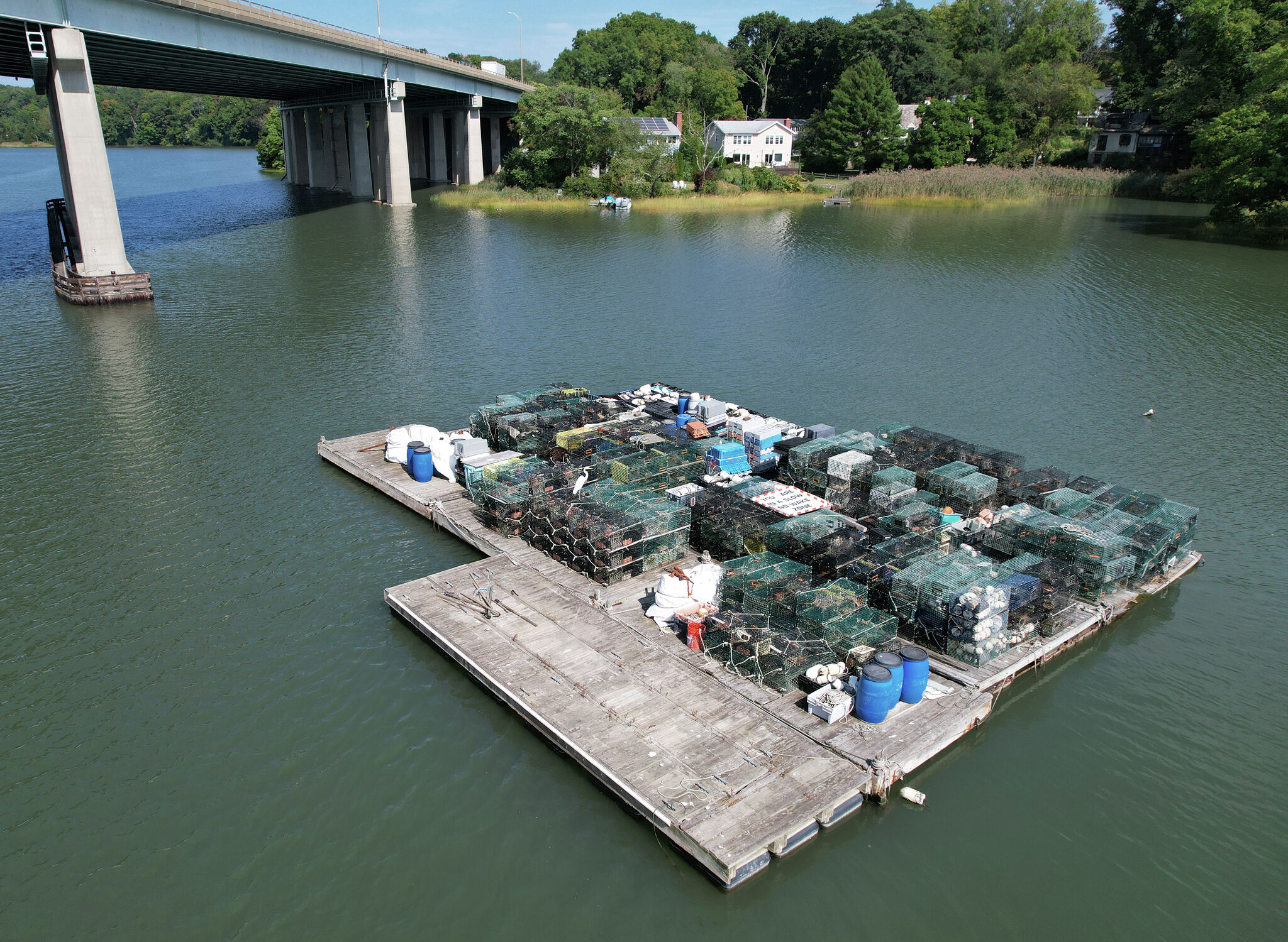 Lobster docks still on Greenwich river year after removal order