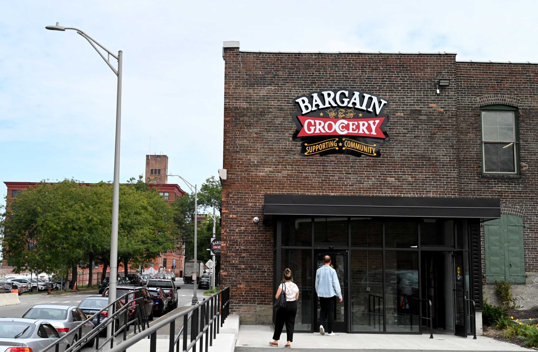 Churchill: Why won't Troy let Bargain Grocery have the sign it needs?