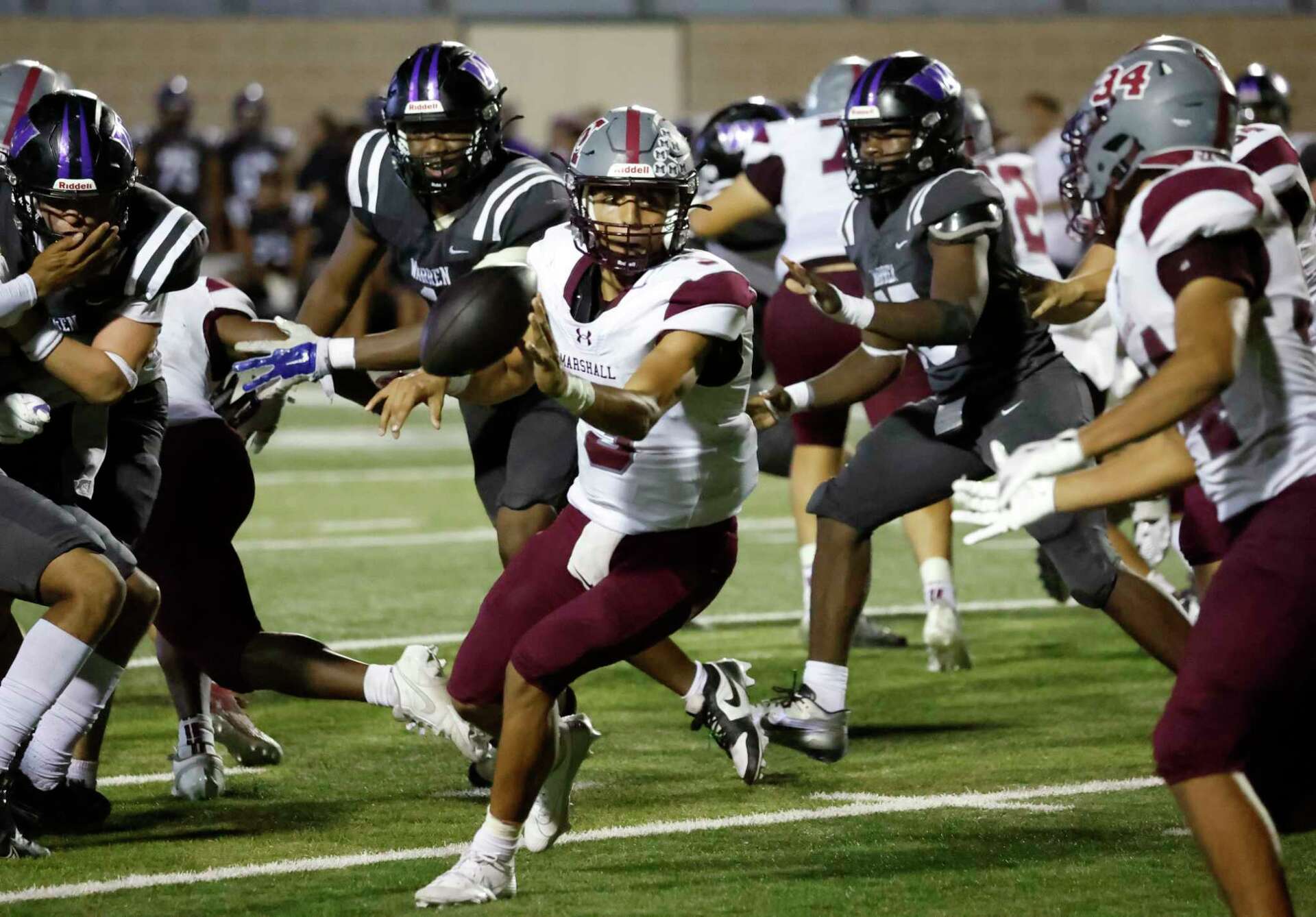 Marshall fends off Warren comeback, wins in overtime