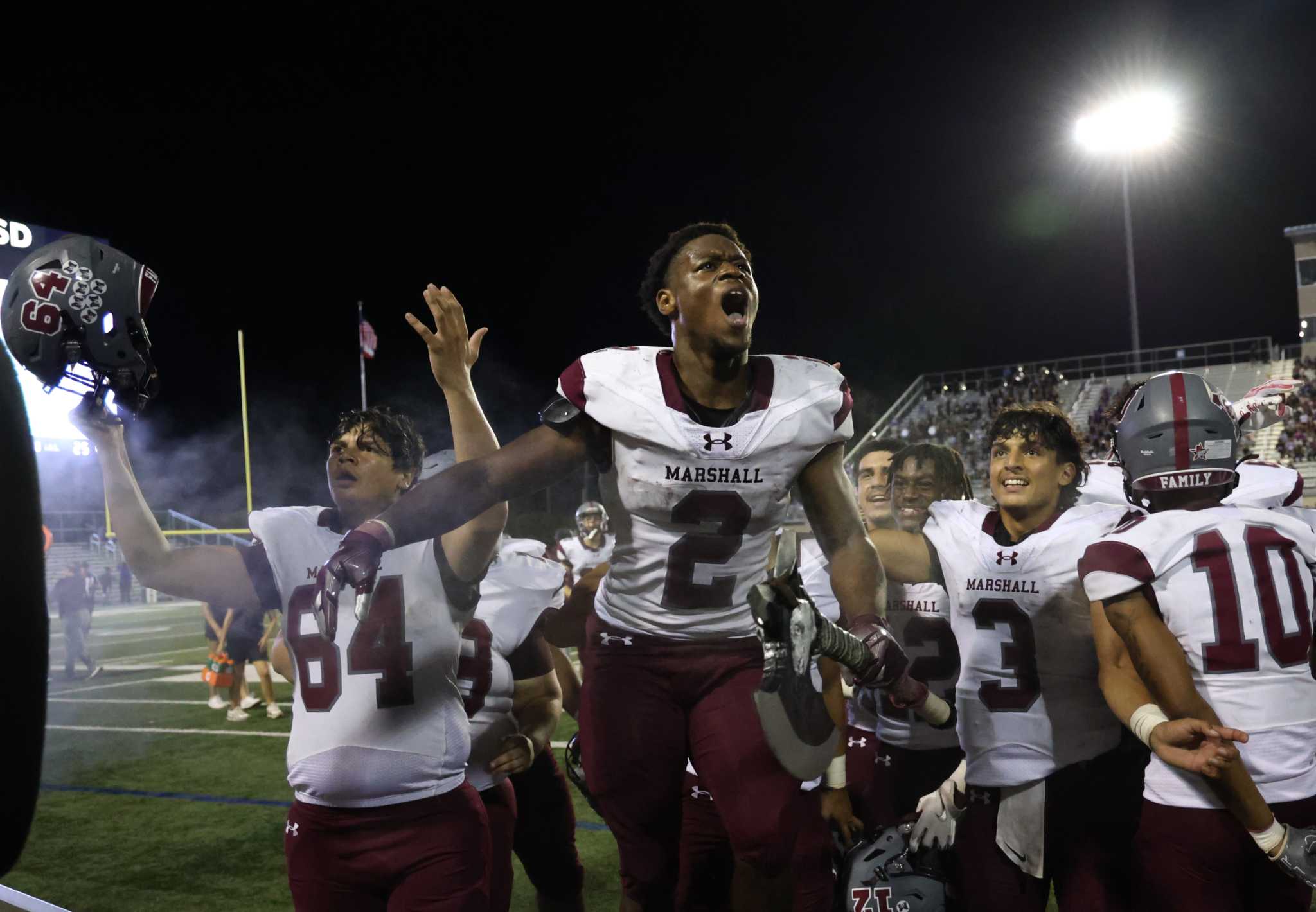 Marshall fends off Warren comeback, wins in overtime
