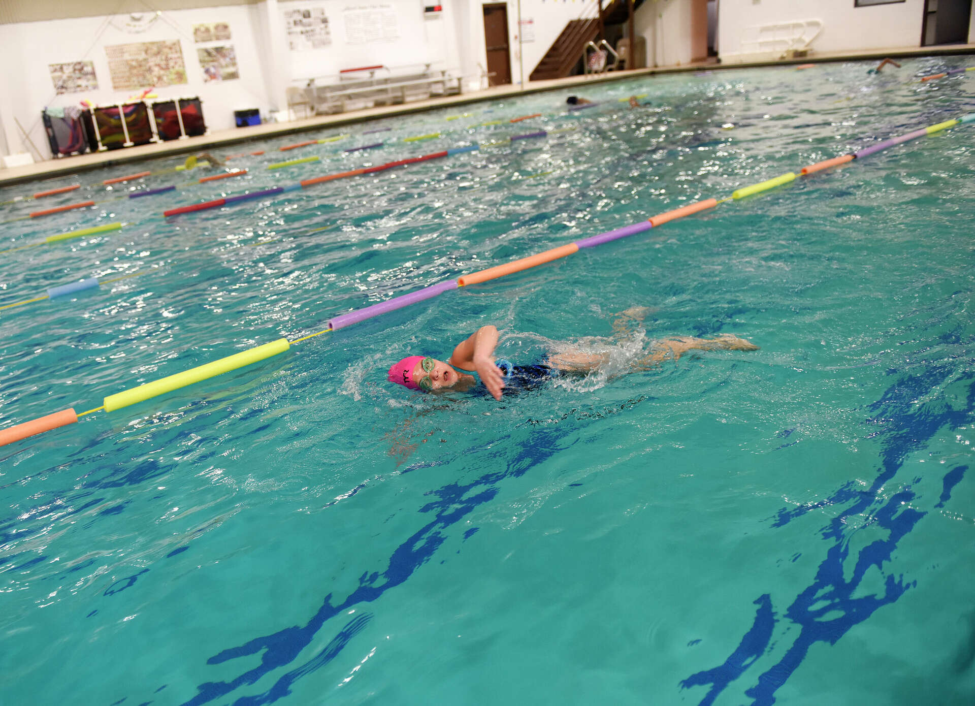 Milford woman fights to keep AquaJets swim team at family natatorium