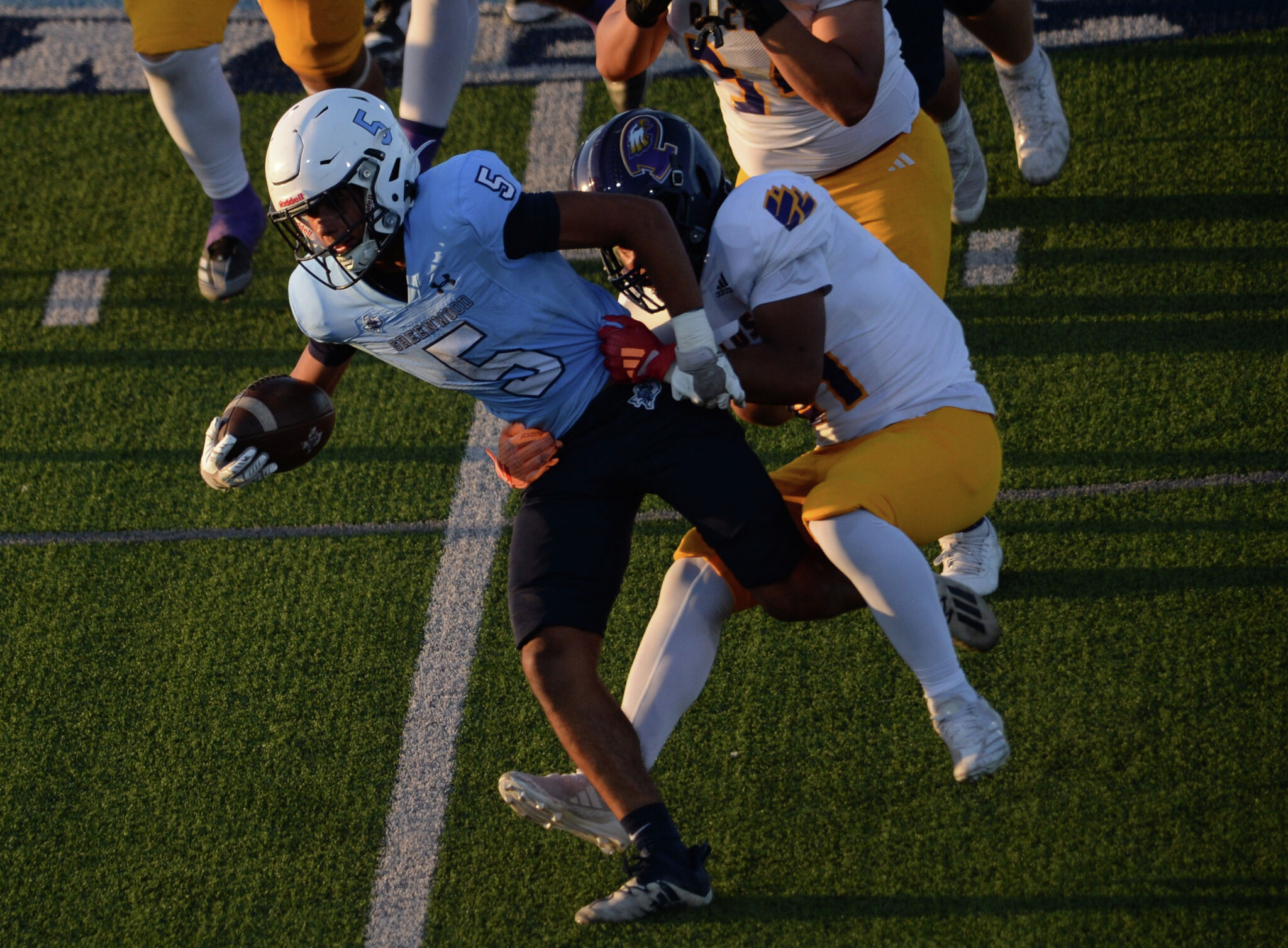 Greenwood football scores in flurries, routs Pecos on homecoming