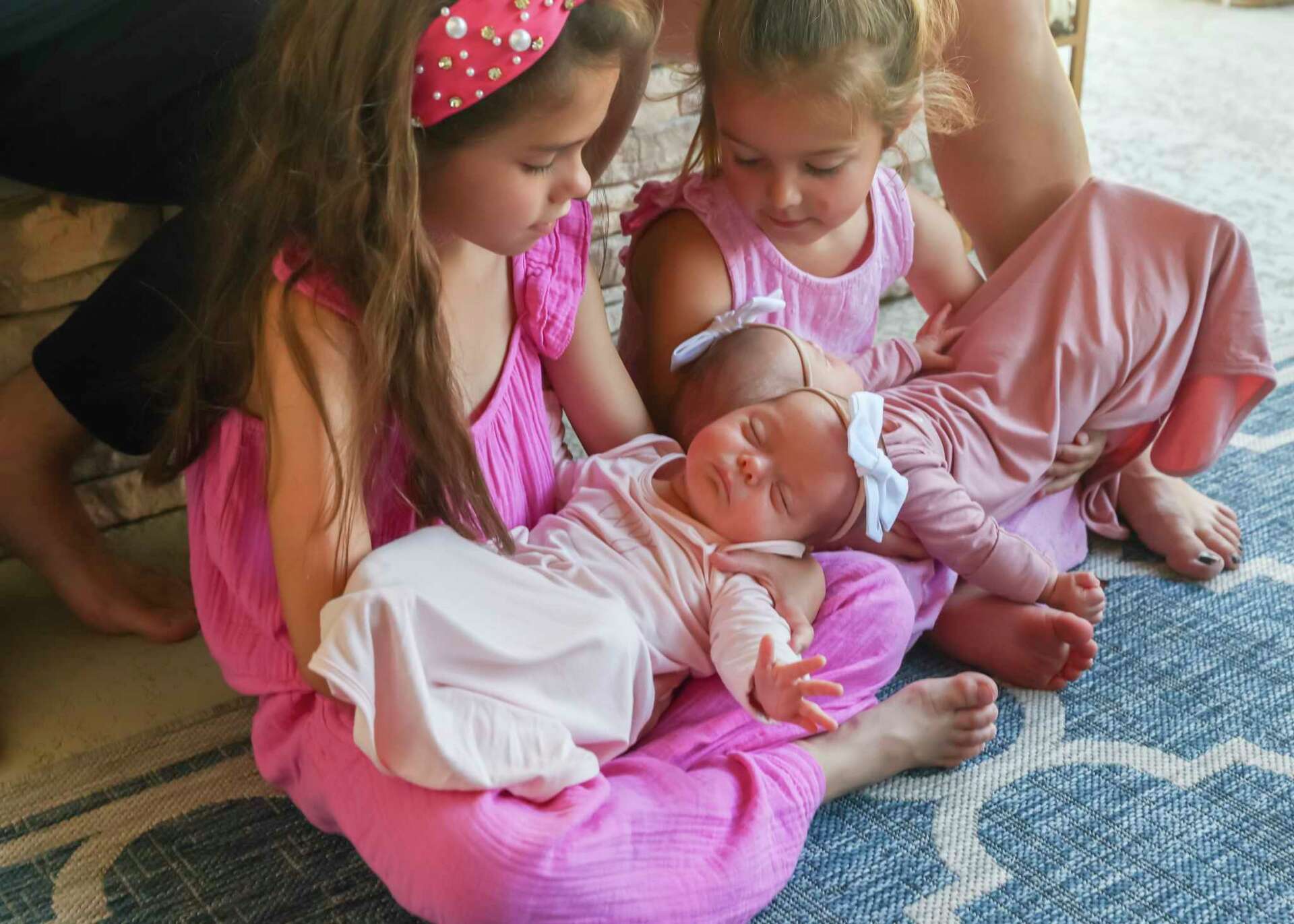 Friendswood 'spontaneous' triplets have set of identical twin girls