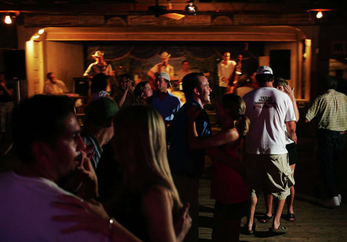 Willie Nelson steps back through his door at Gruene Hall