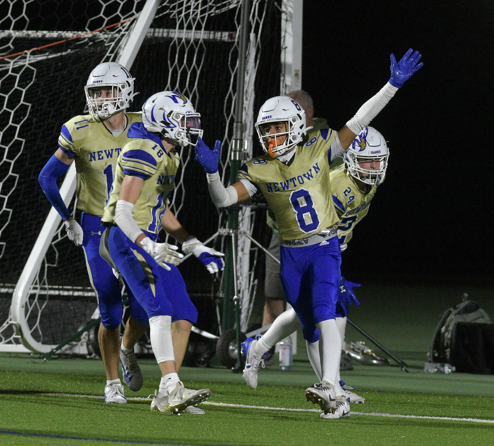 No. 9 Newtown football continues its dominance over New Milford