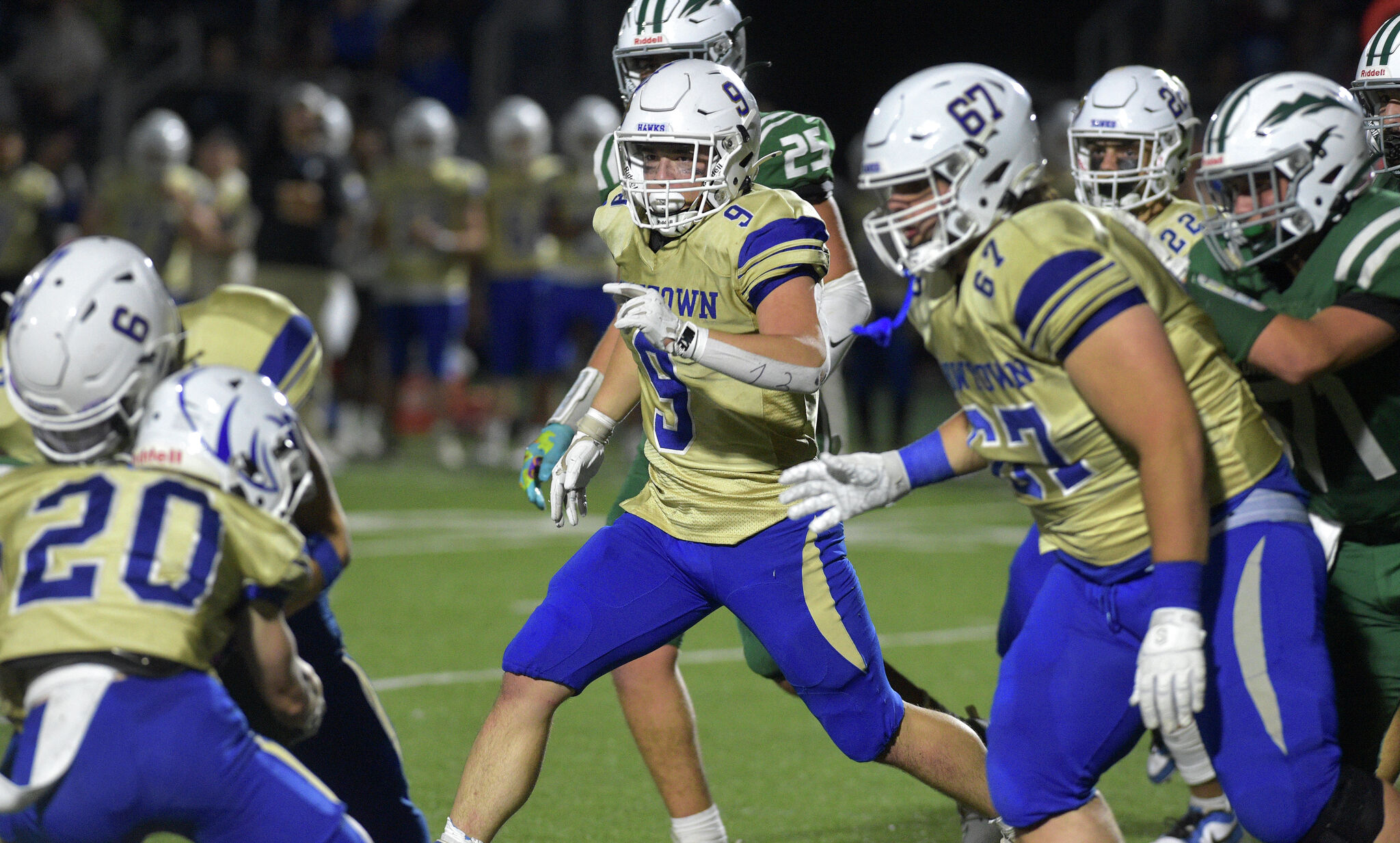 No. 9 Newtown football continues its dominance over New Milford