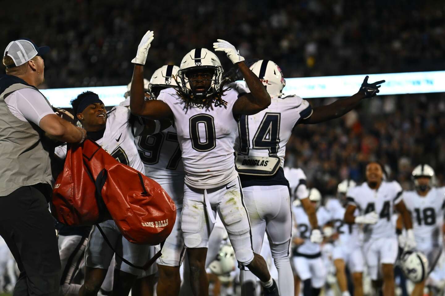 The UConn football team made a goal-line stand to beat Temple.