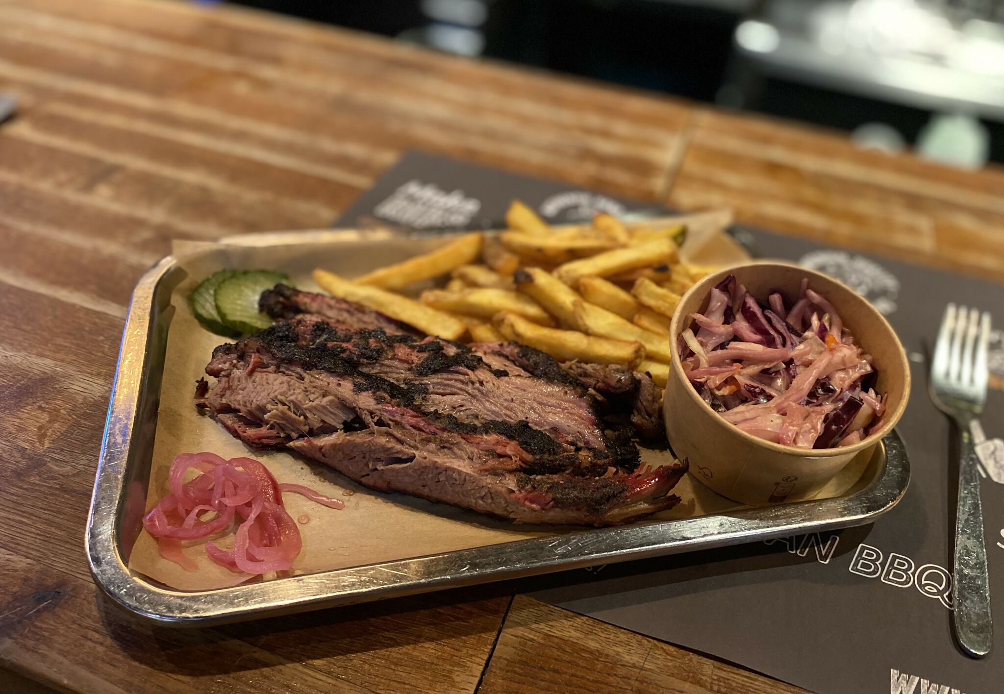 An American barbecue restaurant attracts big crowds in Spain
