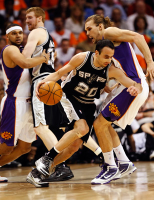 Manu looks for room to maneuver against Suns