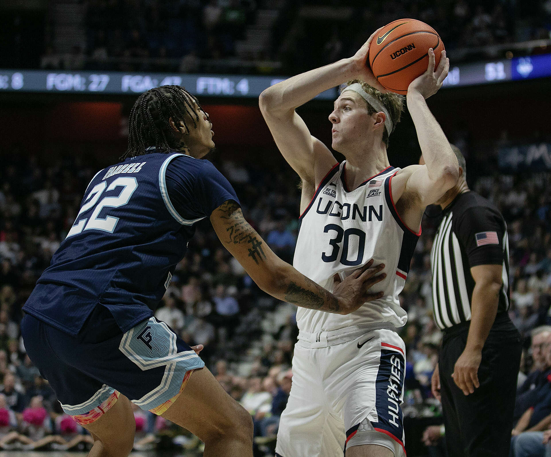 UConn men's basketball's Liam McNeeley out with calf injury