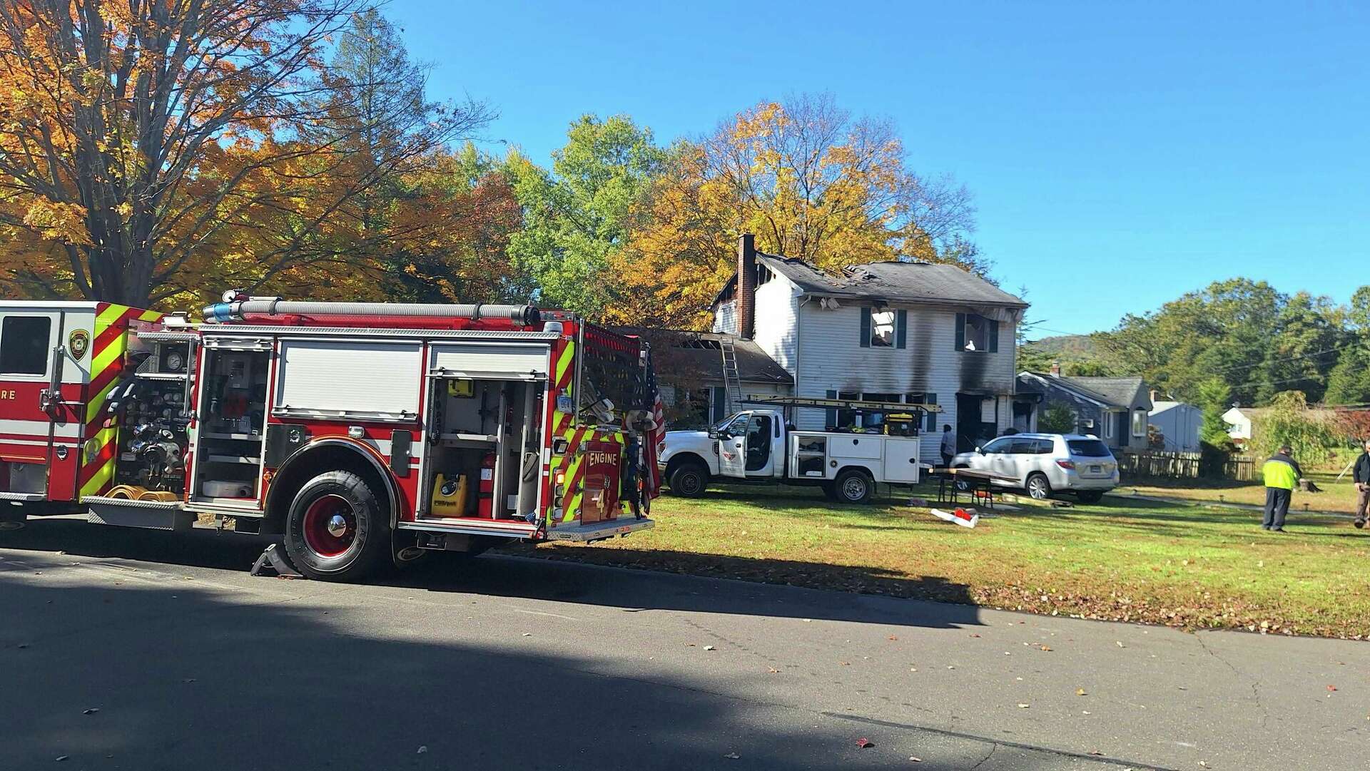 Cheshire firefighters, police saved four people and a dog in fire