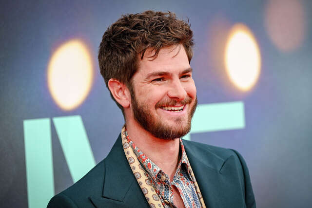 Andrew Garfield talks about missing his mother in appearance with Elmo