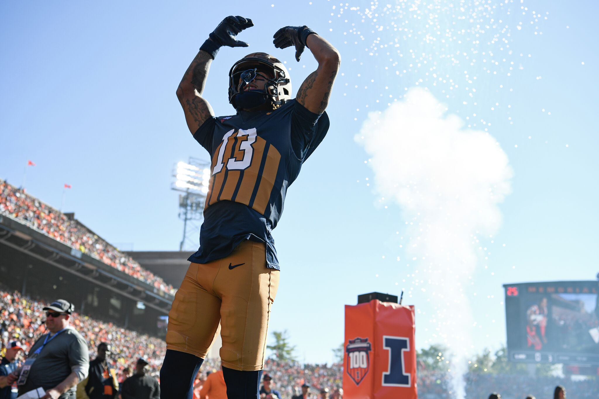 See Illinois celebrate, storm field after win vs. Michigan football
