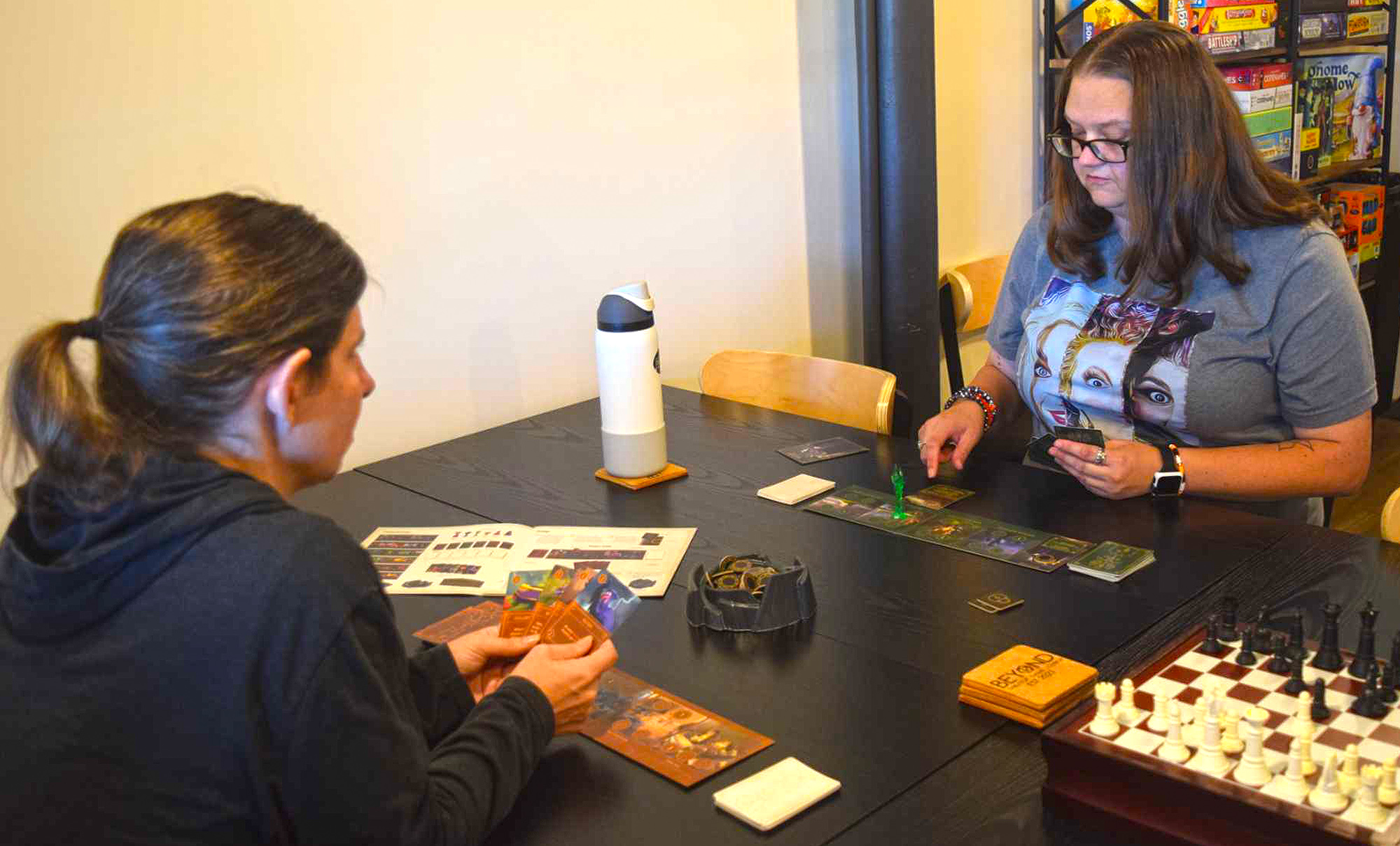 Board game cafes offering community to guests