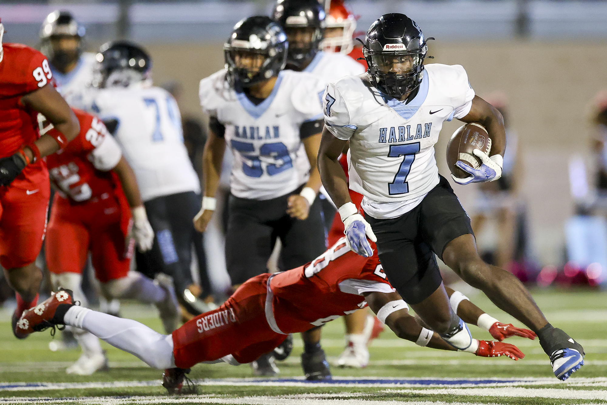 Harlan football routs Taft to run win streak to five games
