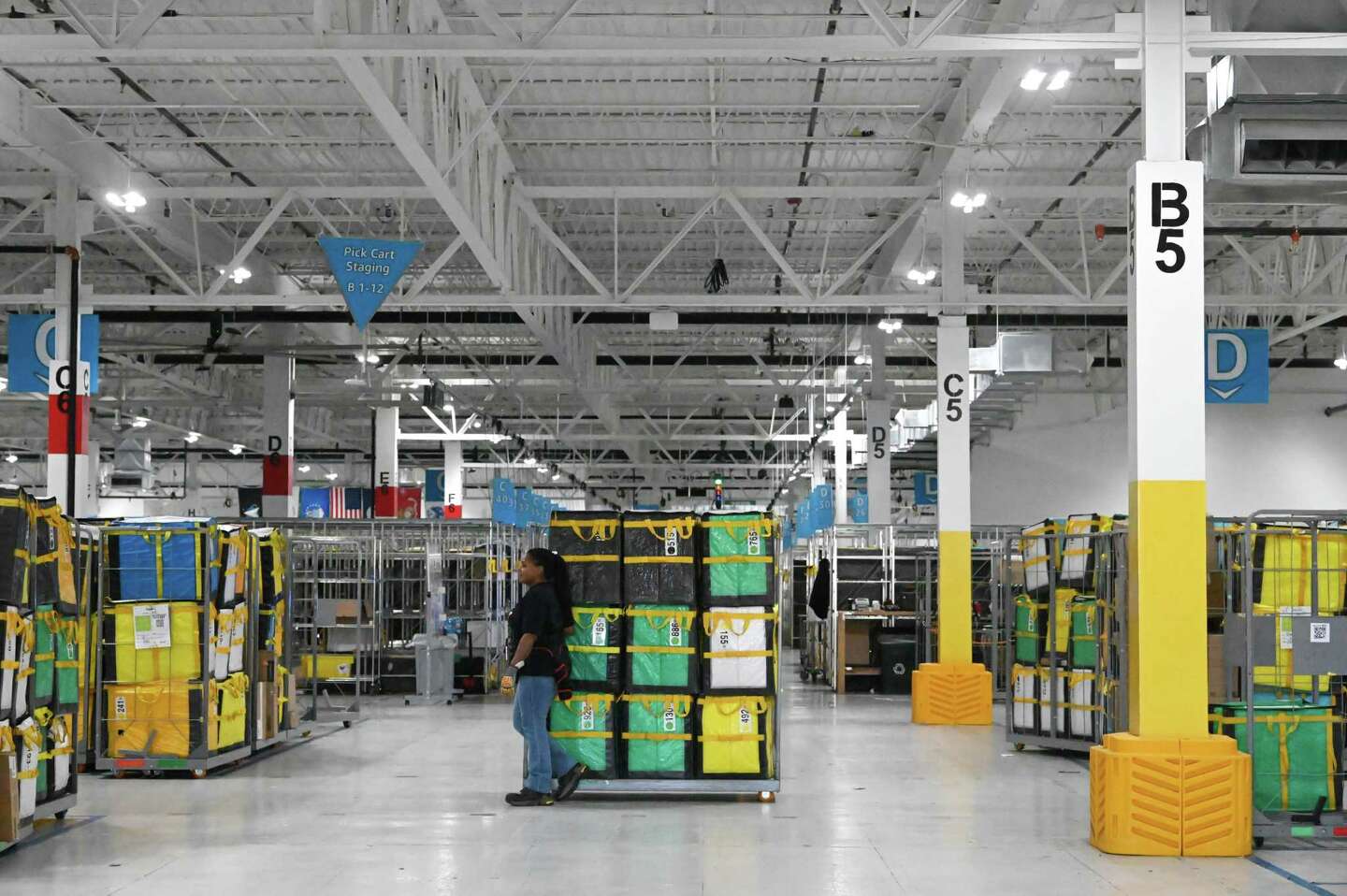 Amazon rolls out new Rivian EVs at Cohoes delivery center