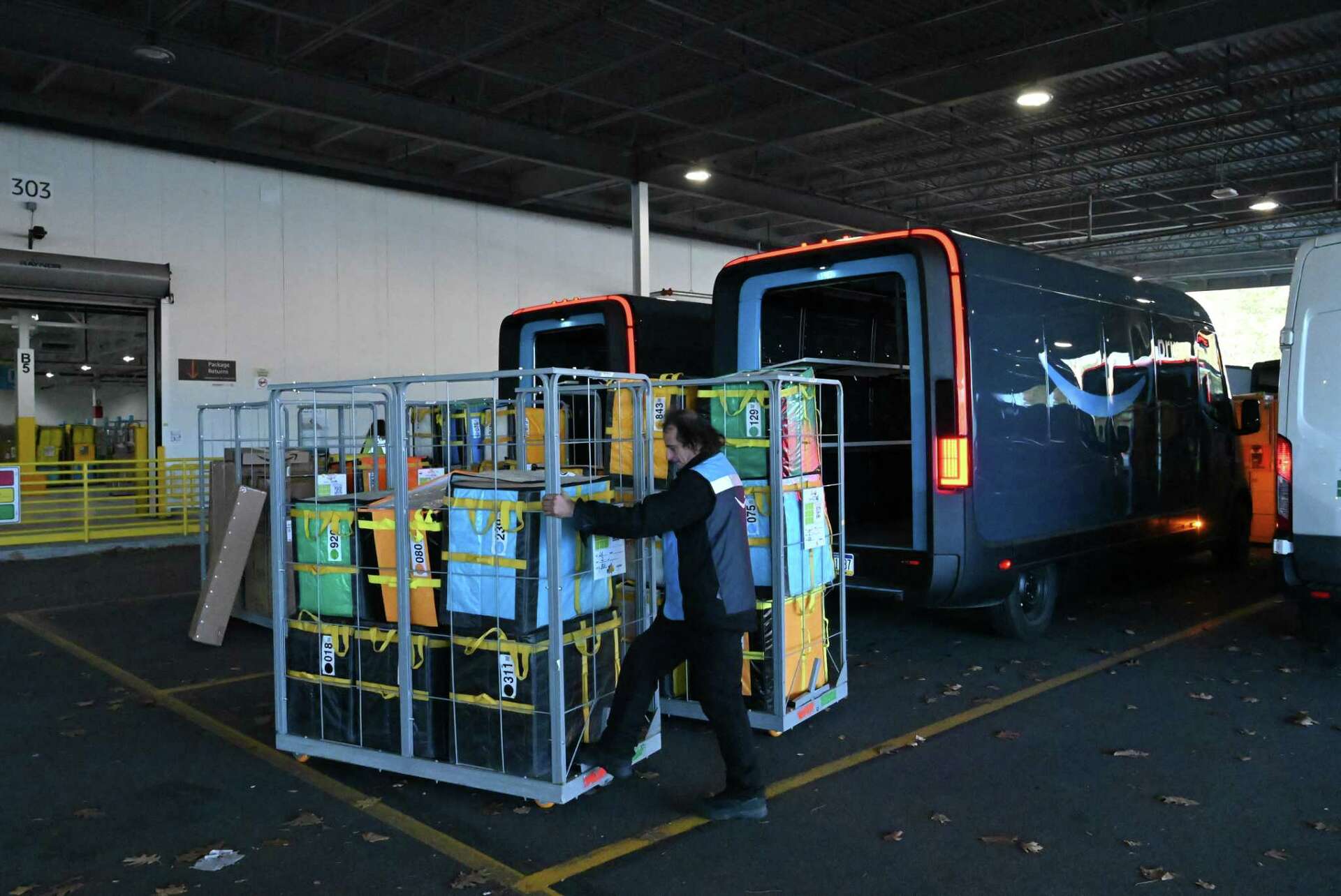 Amazon rolls out new Rivian EVs at Cohoes delivery center