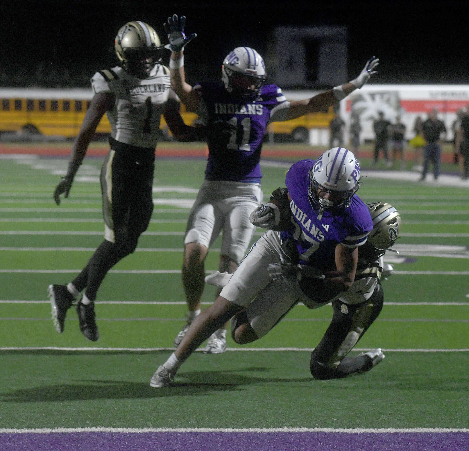 Photos: Nederland beats Port Neches-Groves in Mid-County Madness
