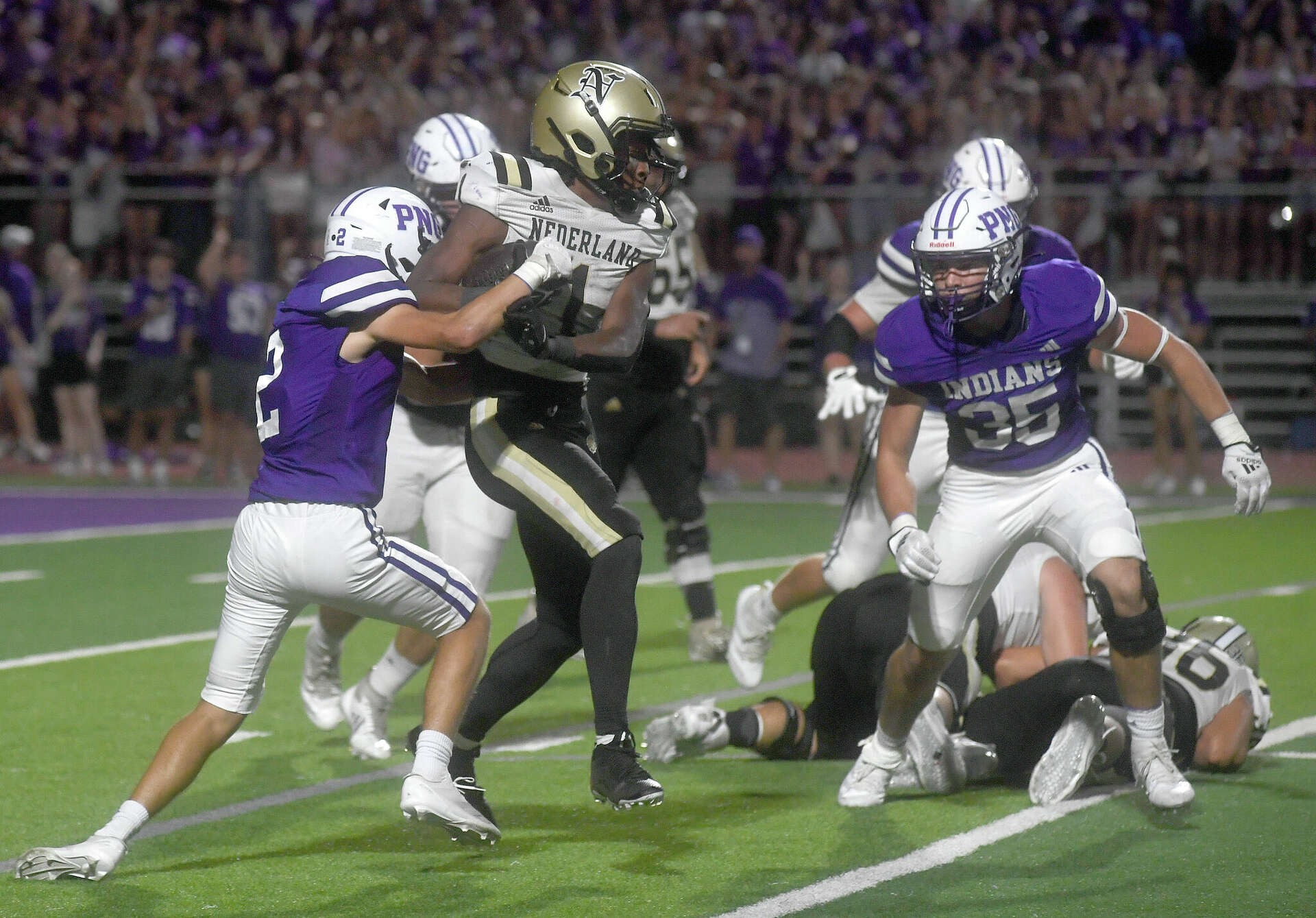 Photos: Nederland beats Port Neches-Groves in Mid-County Madness
