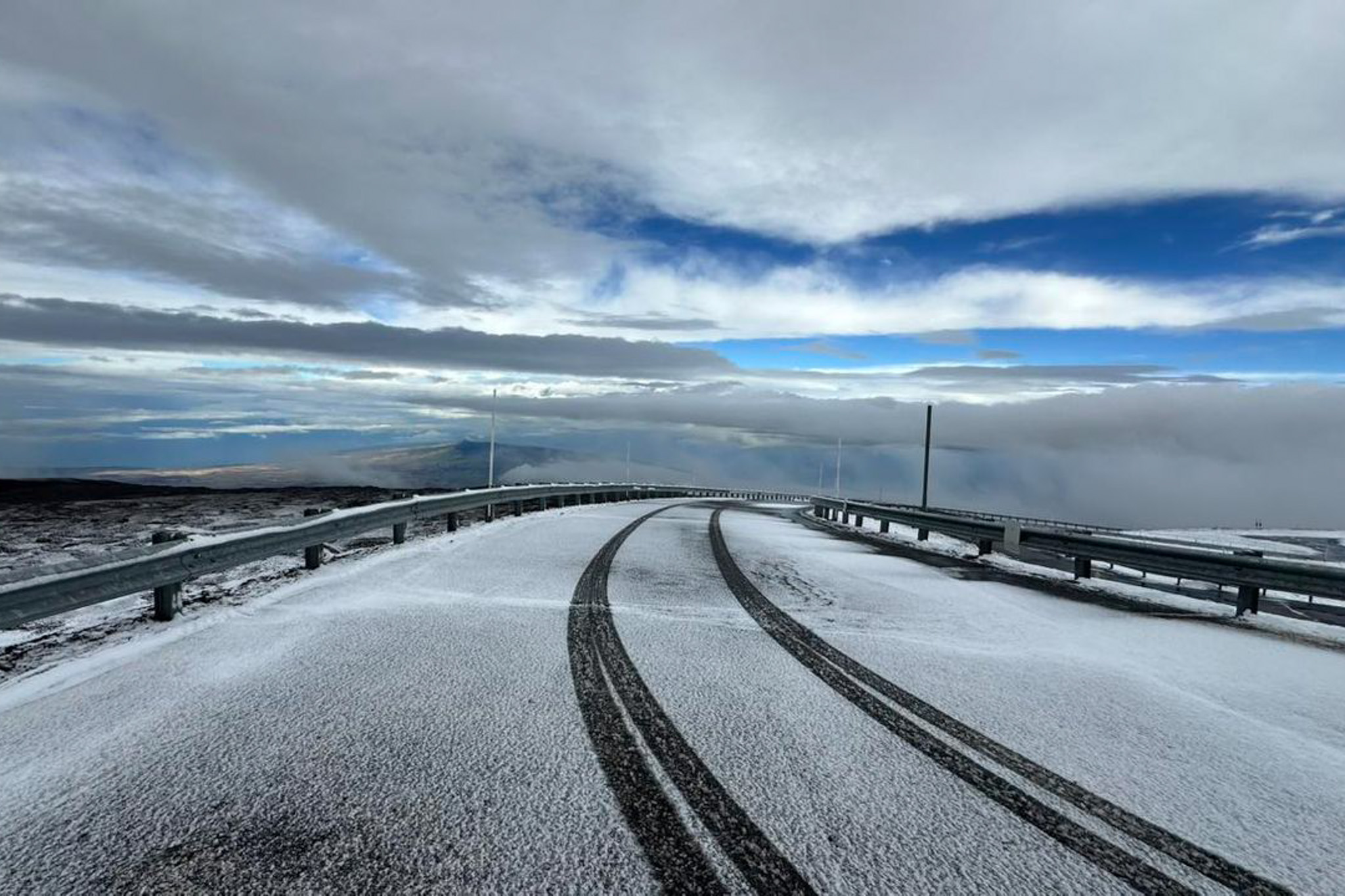 'Winter is here': Snow falls on Hawaii's tallest peaks