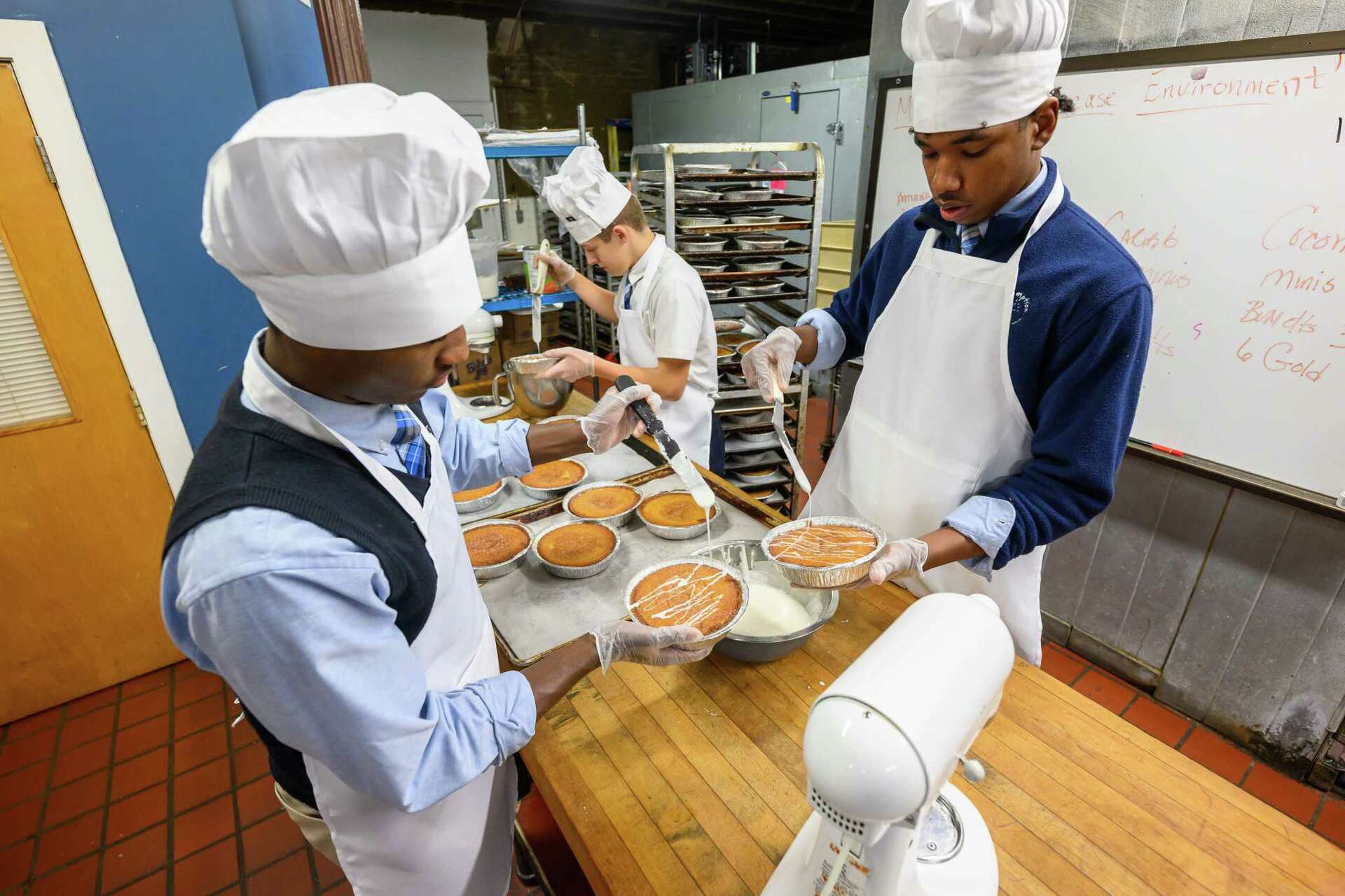 Troy Redemption Christian Academy builds futures in cake, basketball