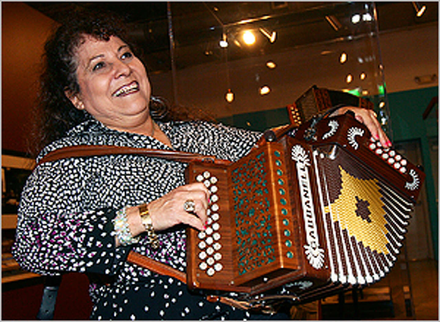 Female accordionists tapping into conjunto