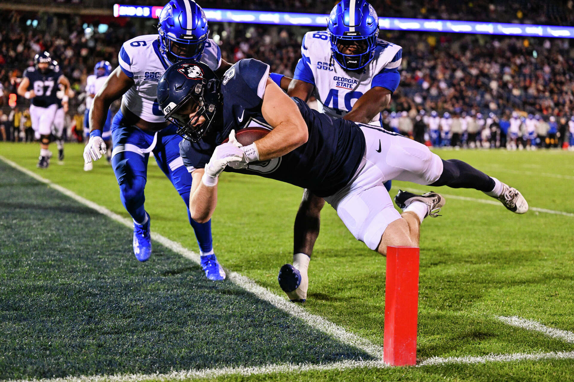 UConn football team holds off Georgia State, becomes bowl eligible