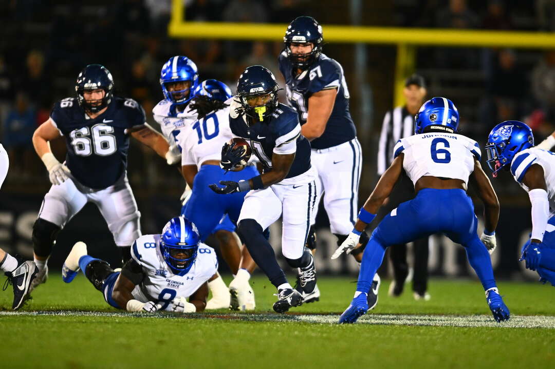 UConn football team holds off Georgia State, becomes bowl eligible