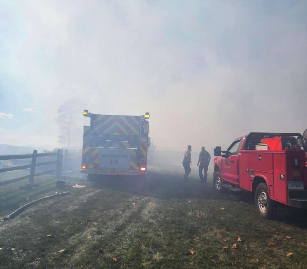 Officials: Washington brush fire stopped from spreading to nearby home