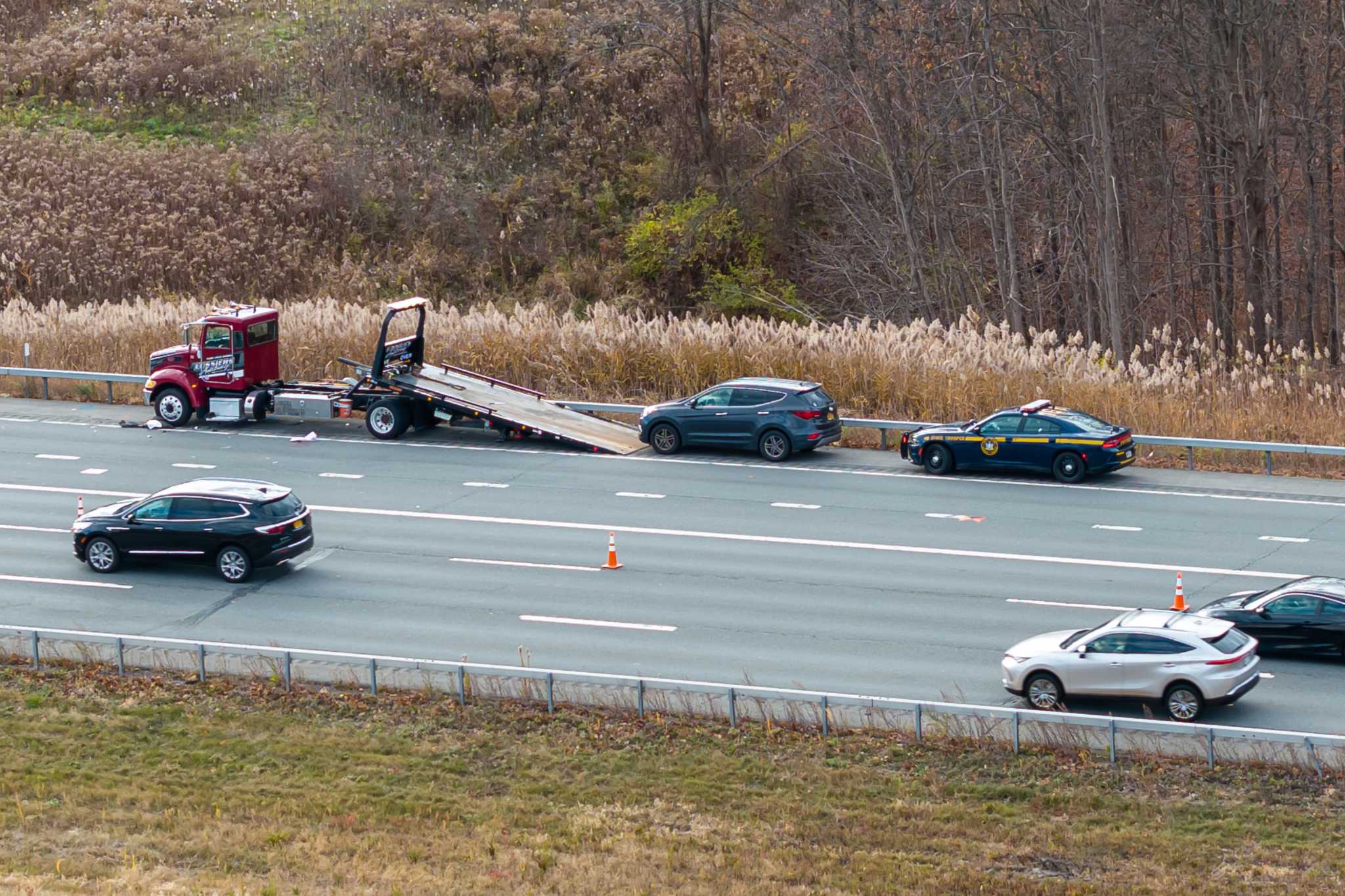 Trooper, tow truck driver hit during Northway traffic stop