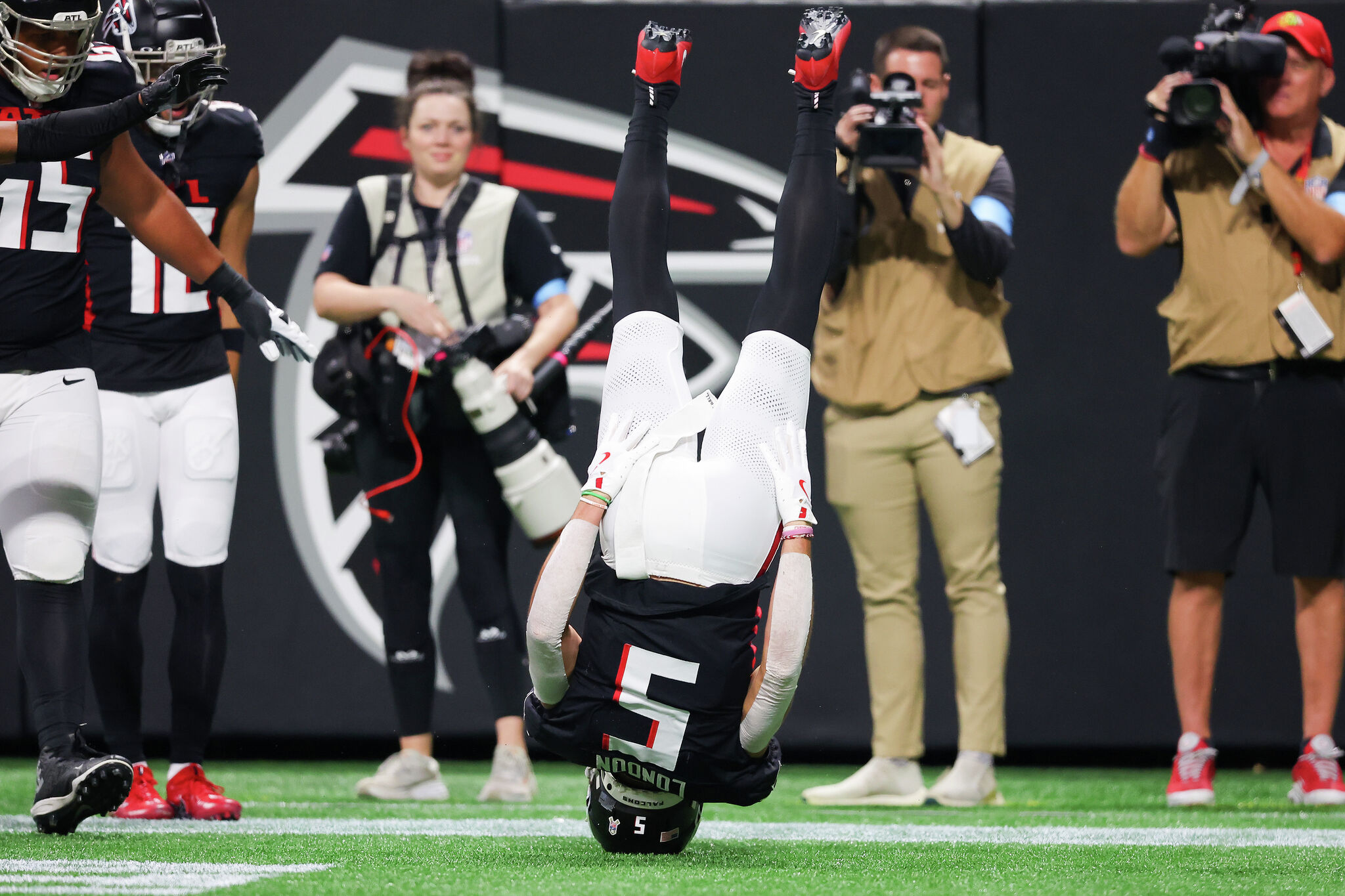 Here's the origin of NFL headstand celebration by St. Brown