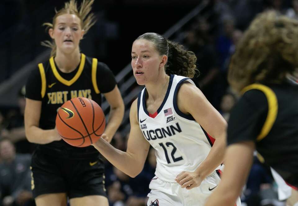 UConn star Paige Bueckers celebrates Ashlynn Shade's development