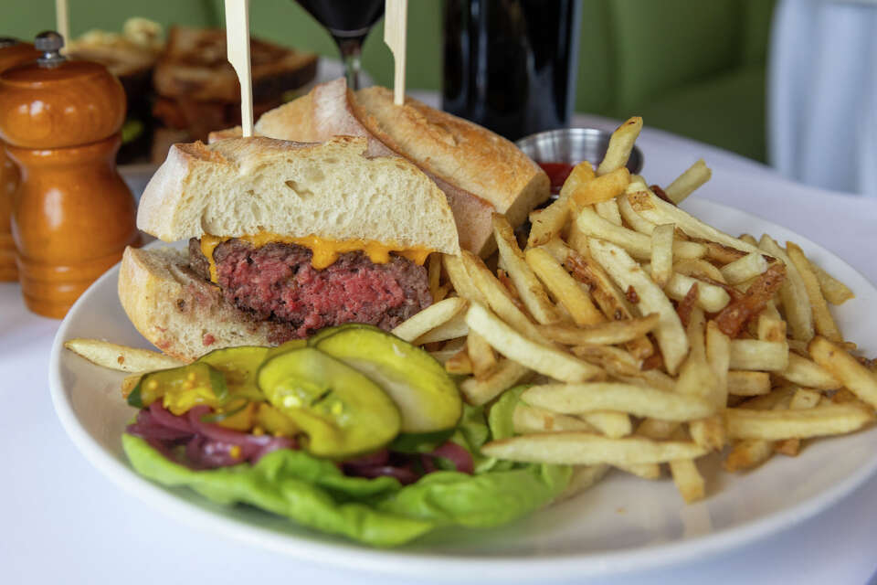 At a 110-year-old SF spot, the burger is almost as famous as the owner