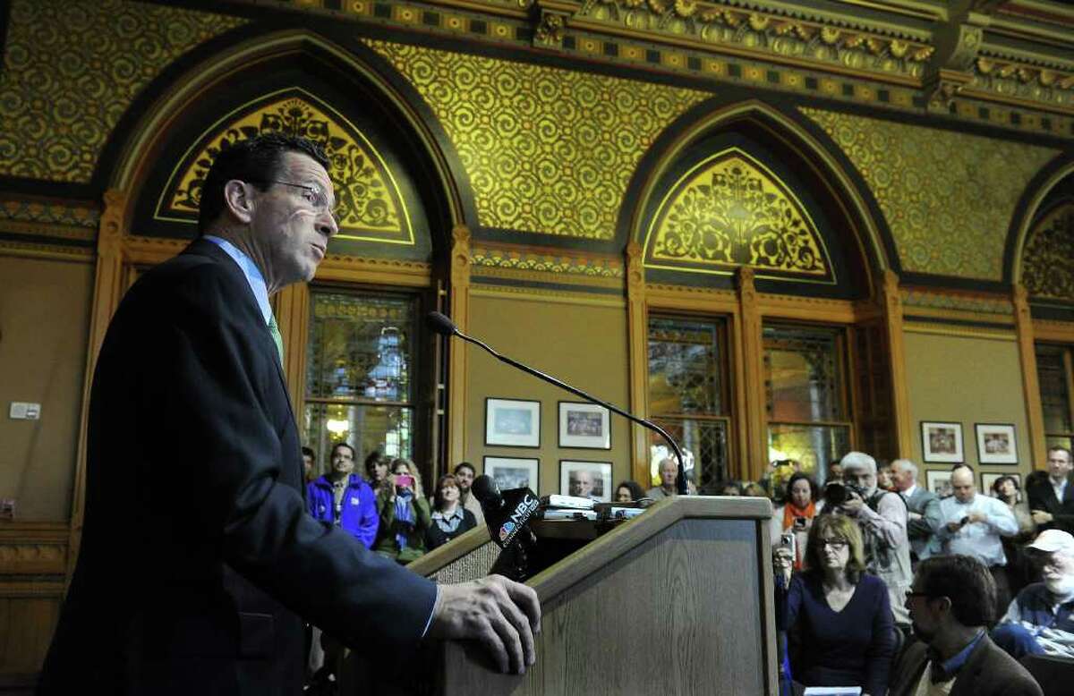 Malloy declared winner, but Foley fights on